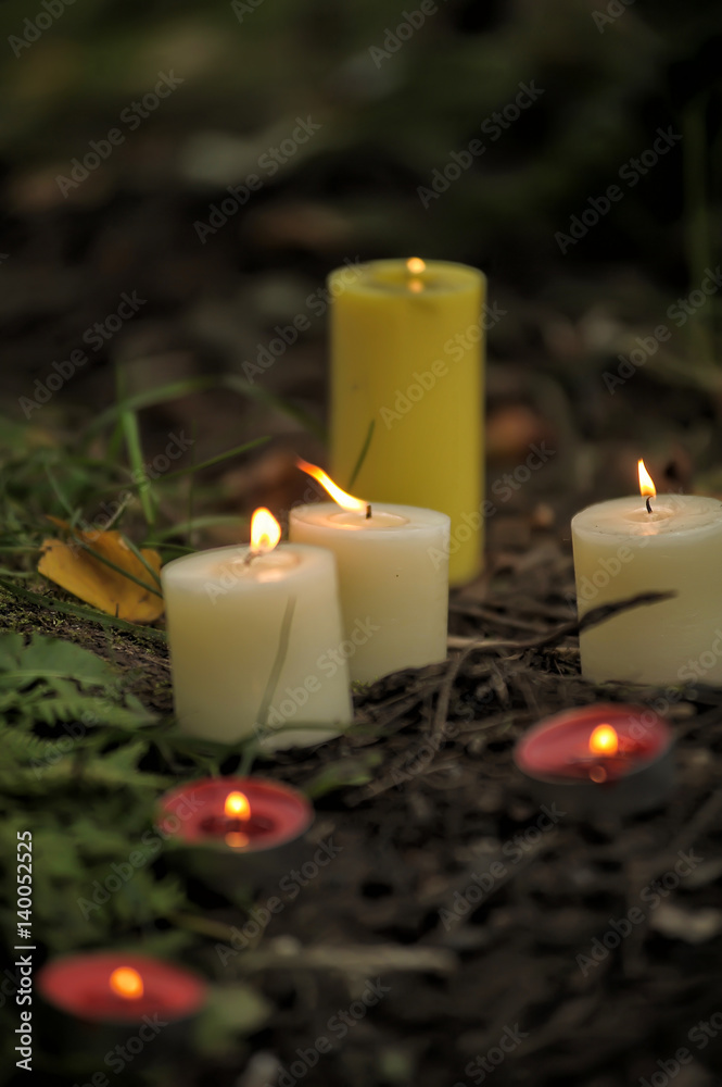 Candles on the ground Stock Photo | Adobe Stock