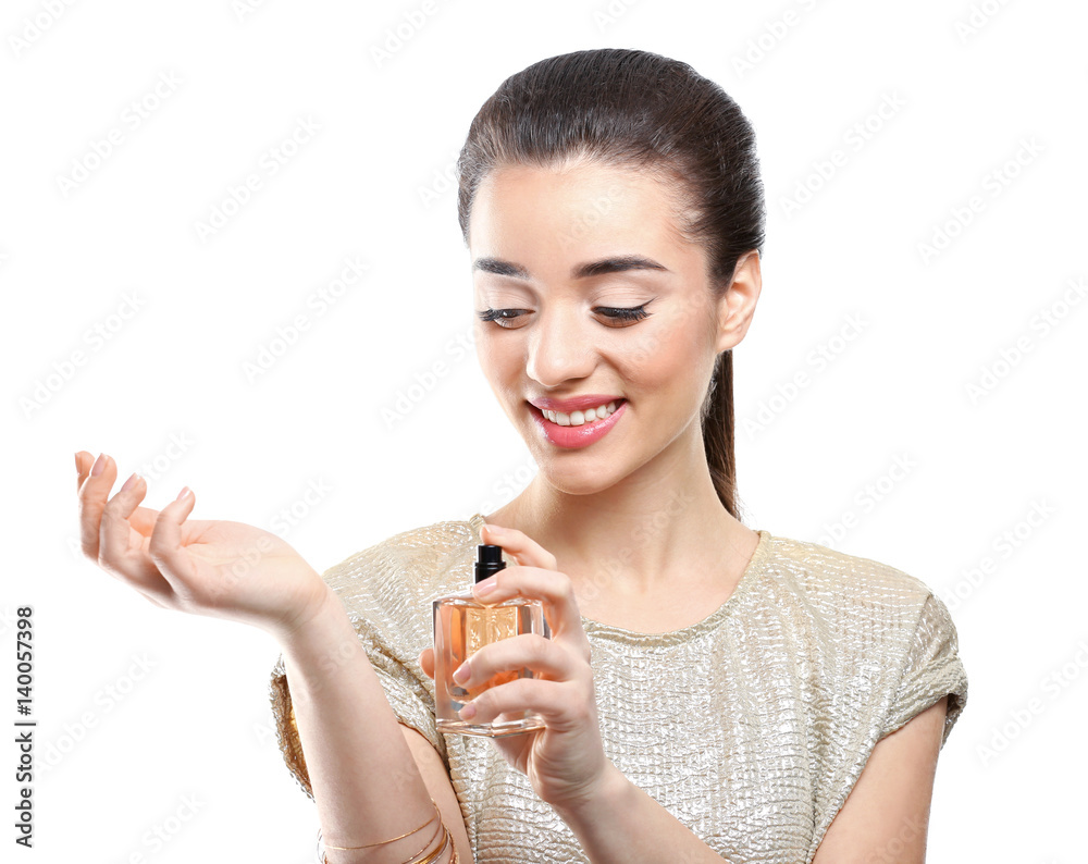 Beautiful young woman with bottle of perfume on white background Stock ...