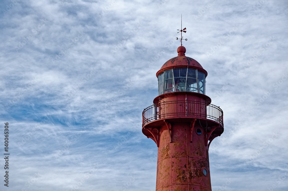 Marine beacon on a background of the cloudy sky. Stock Photo | Adobe Stock