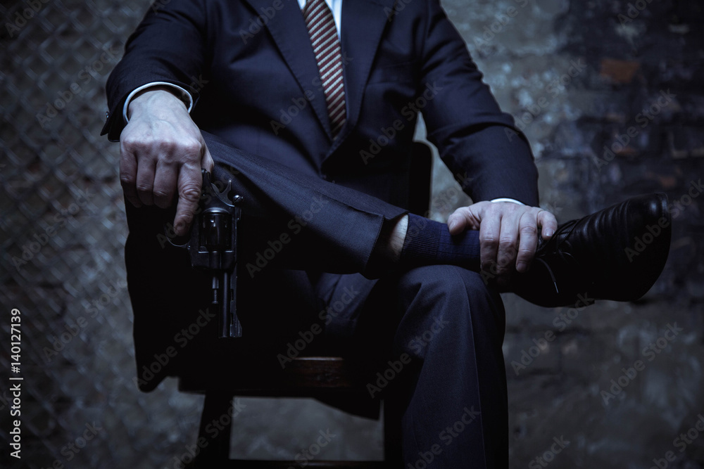 Photo & Art Print Big mafia boss posing with his weapon, Viacheslav ...