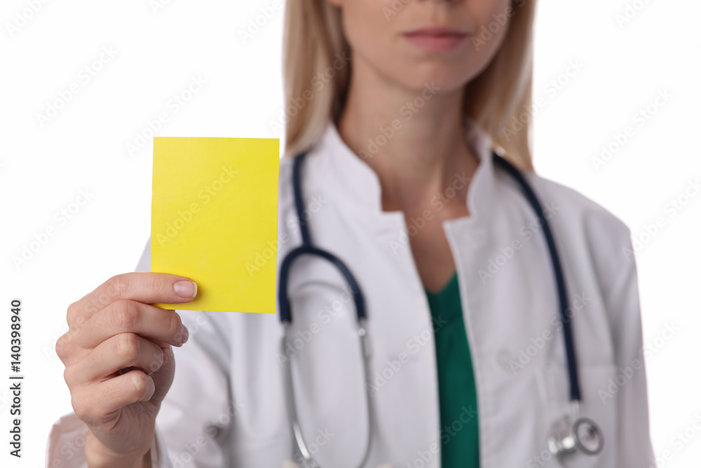 Doctor showing yellow card to patient. Health care concept ...