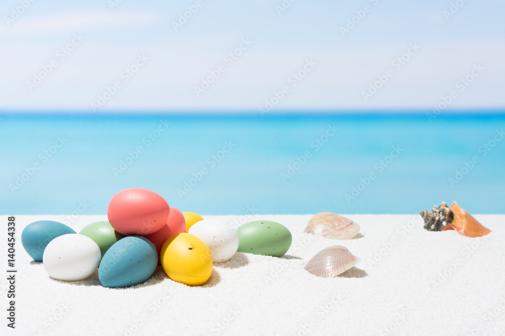 Easter on tropical beach background. Eggs on the white sand. Vacation ...