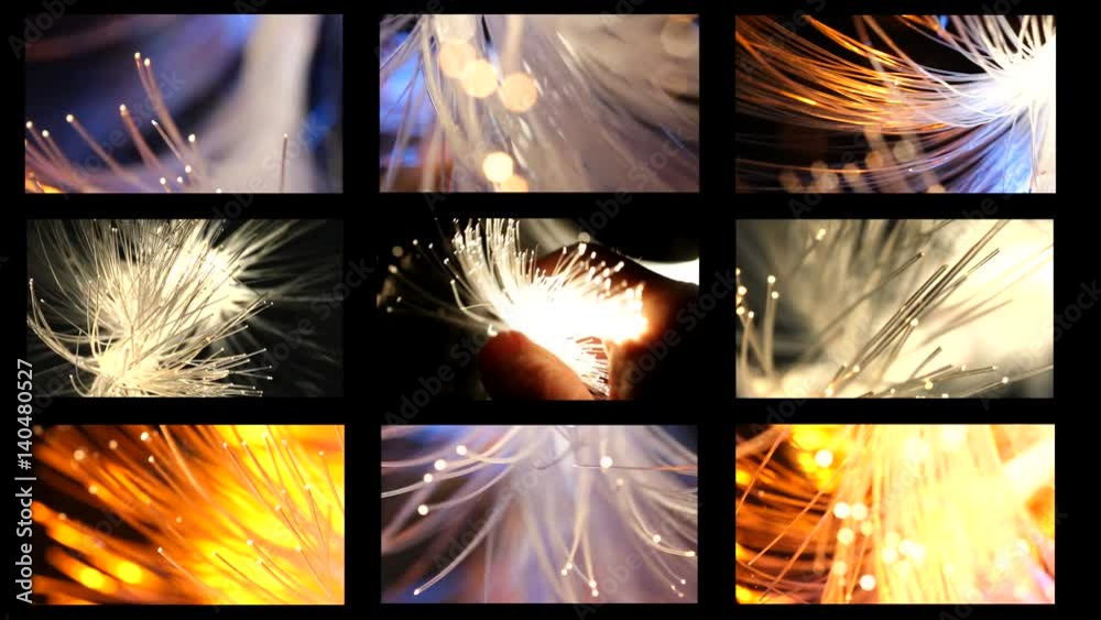 An array of nine screens of brightly lit fibre optic cables ...