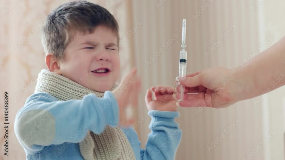 medical instruments for injections, child is afraid of the injection ...