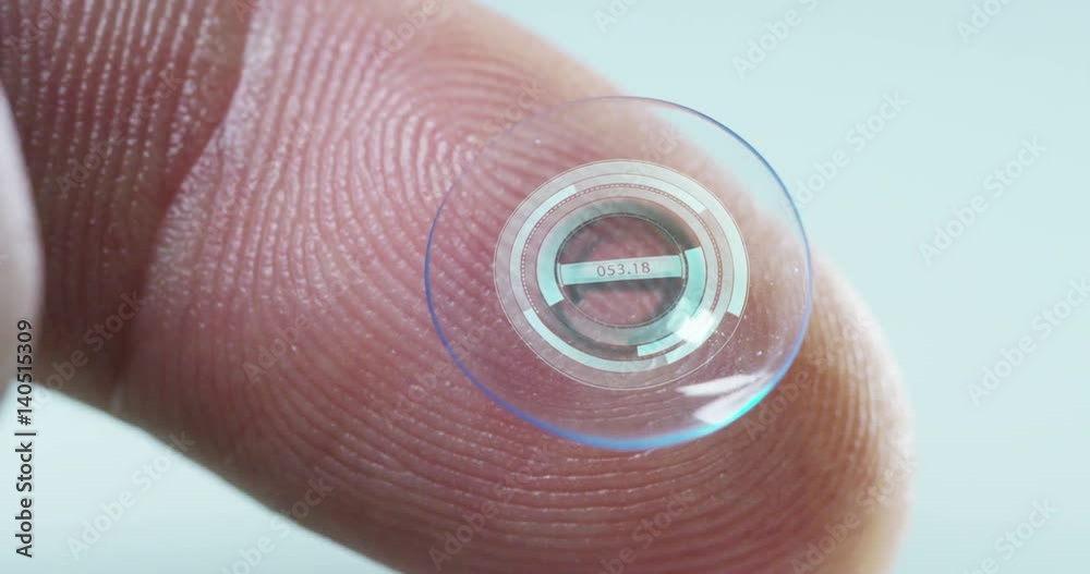 Vídeo do Stock: Macro shot of a finger holding a contact lens ...