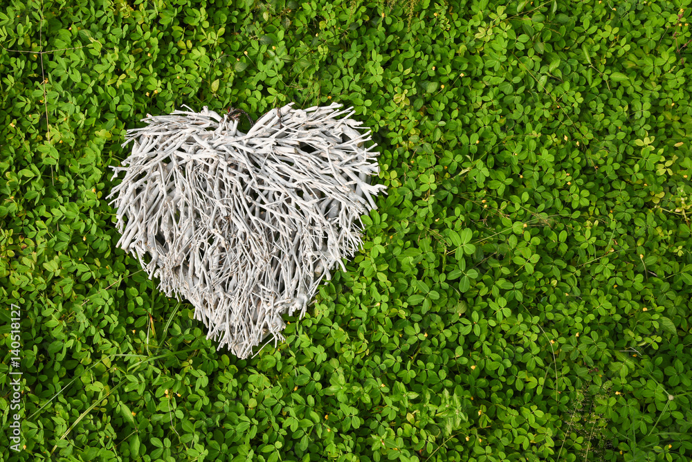 Man wearing red shirt holding a white heart with both hands, Kerala ...