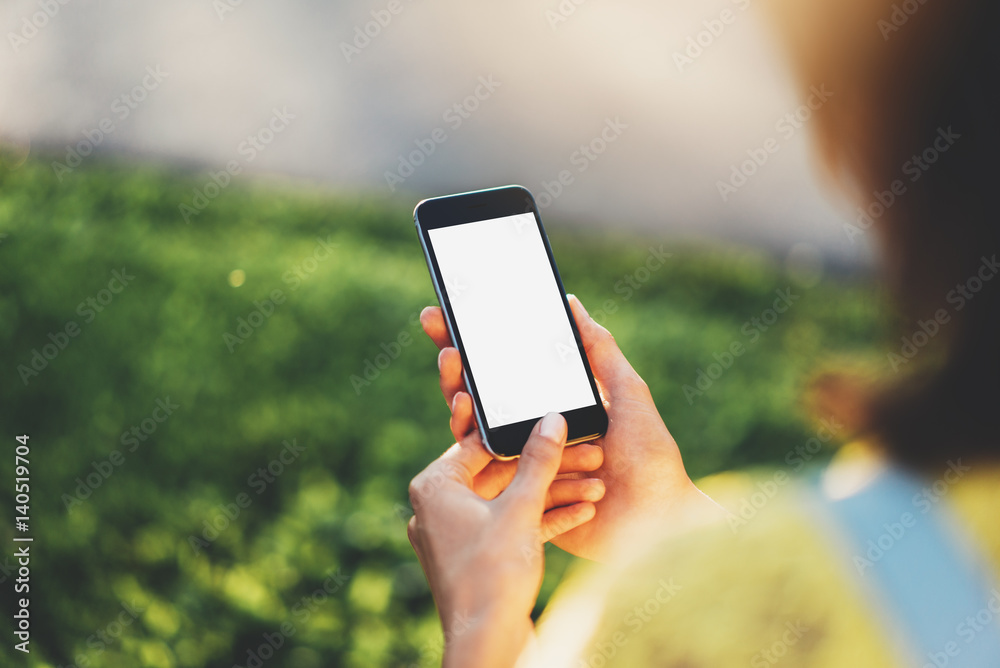 Mockup of modern smartphone device, young hipster girl holding ...