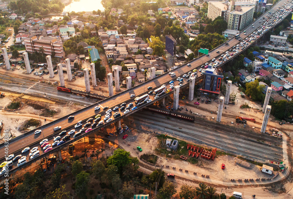 Traffic jam in rush hour,expressway. Freight and passenger train ...