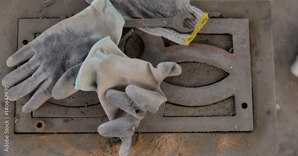 Top view of old desk, workers work equipment (old gloves and ...