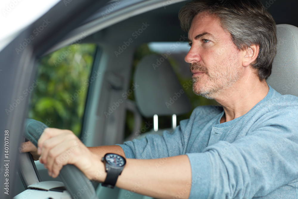 Man driving car Stock Photo | Adobe Stock