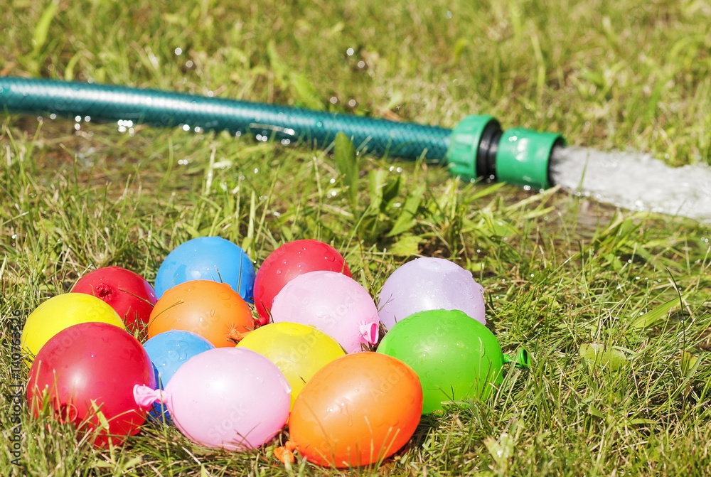 Colorful balloons in grass Stock-Foto | Adobe Stock