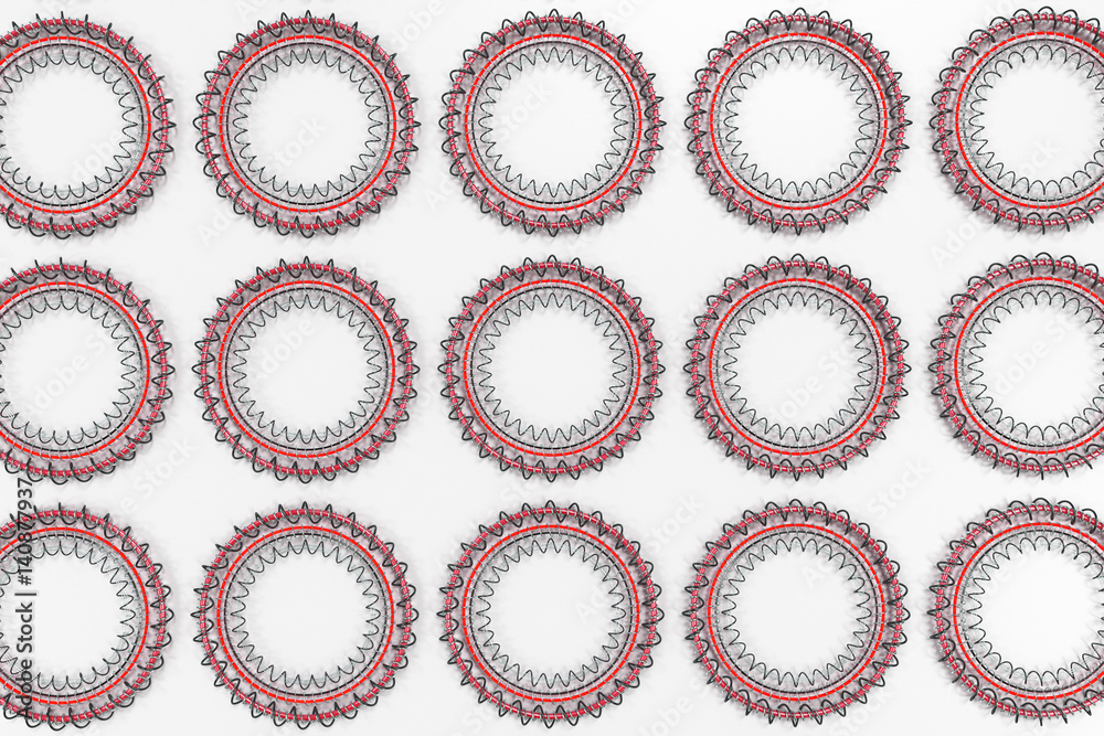 Pattern of concentric shapes made of rings and spirals on white ...
