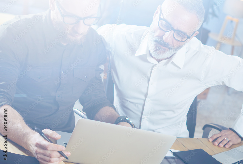 Group of two partners making great idea during work process in modern ...