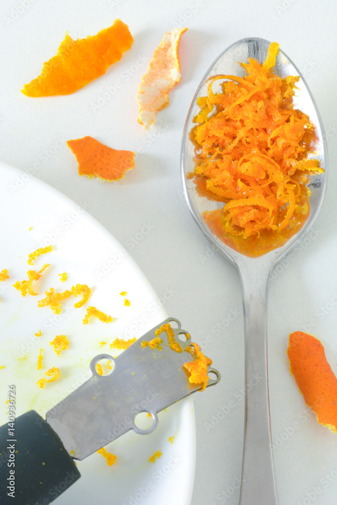 Grated orange zest for baking Stock Photo | Adobe Stock