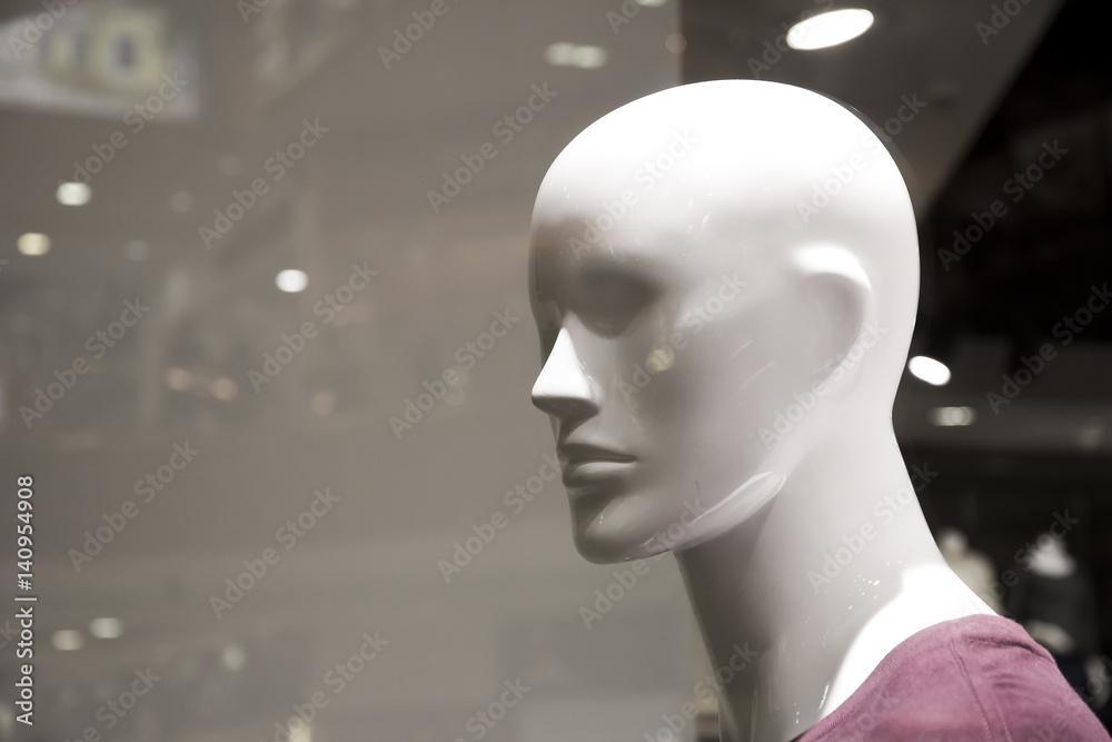 bald head of dummy in shop window Stock Photo | Adobe Stock