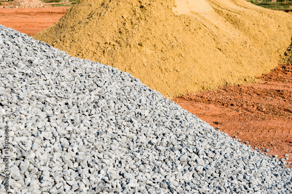 Construction sand pile and rocks Stock Photo | Adobe Stock