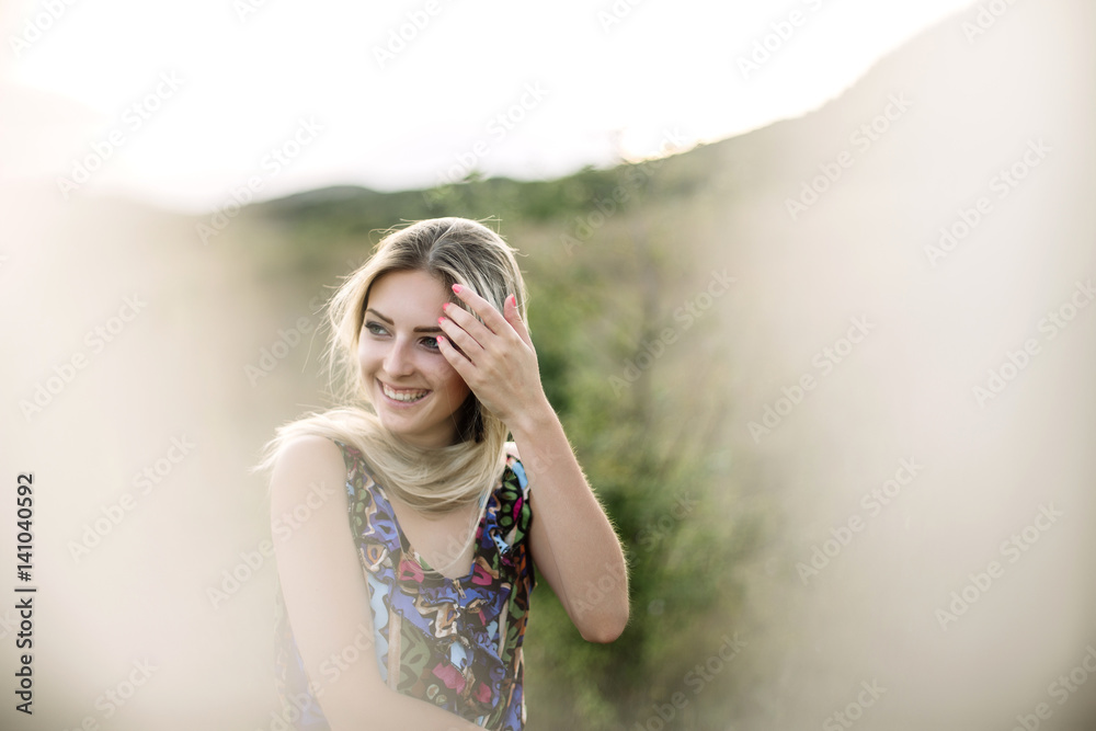 Beautiful Dreamy Blonde Girl With Blue Eyes In A Light Turquoise Dress