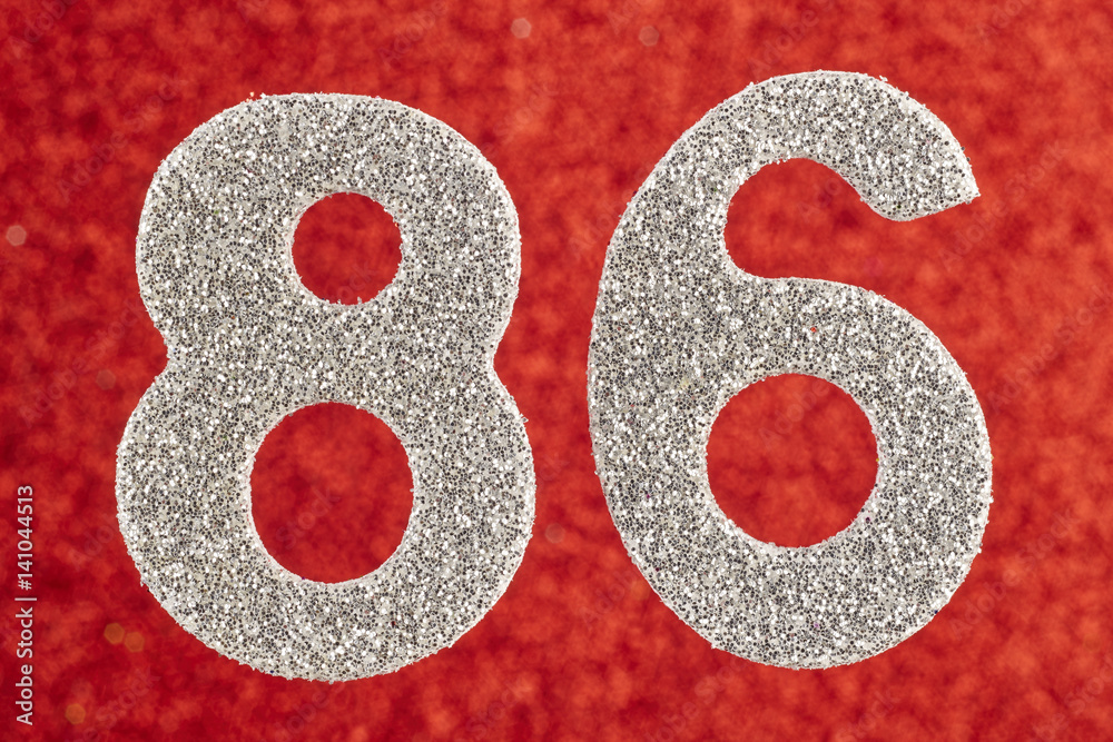 Number eighty-six silver color over a red background. Anniversary ...