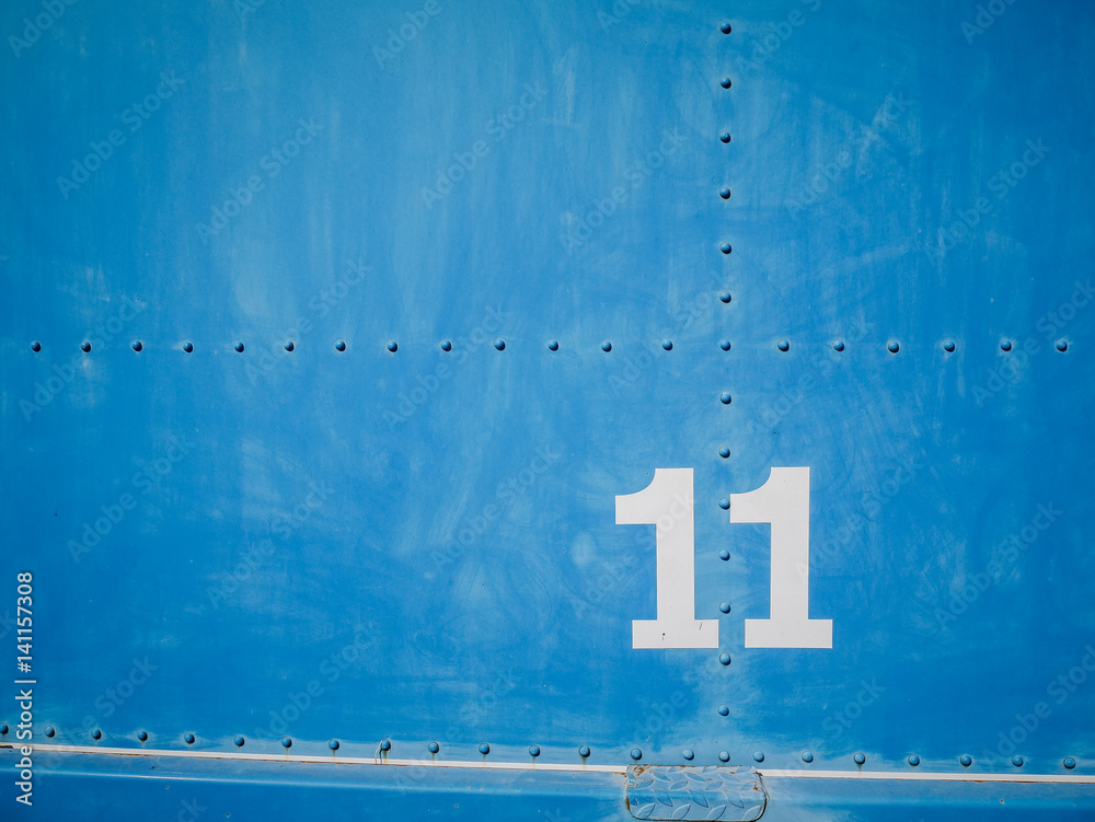 Number eleven in white with blue background and rivets, beautiful ...