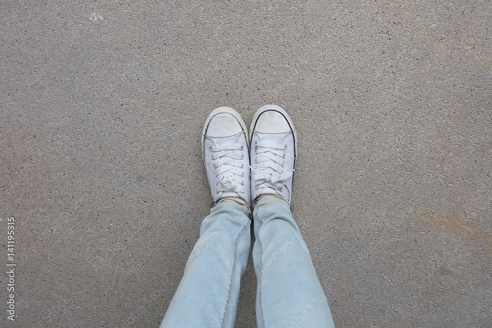 Feet From Above Concept, Teenage Person in White Sneakers Standing on ...