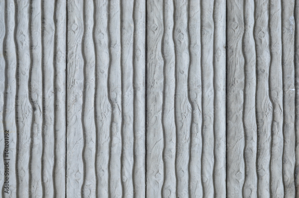 Texture of concrete fence with relief and texture like a stone wall ...