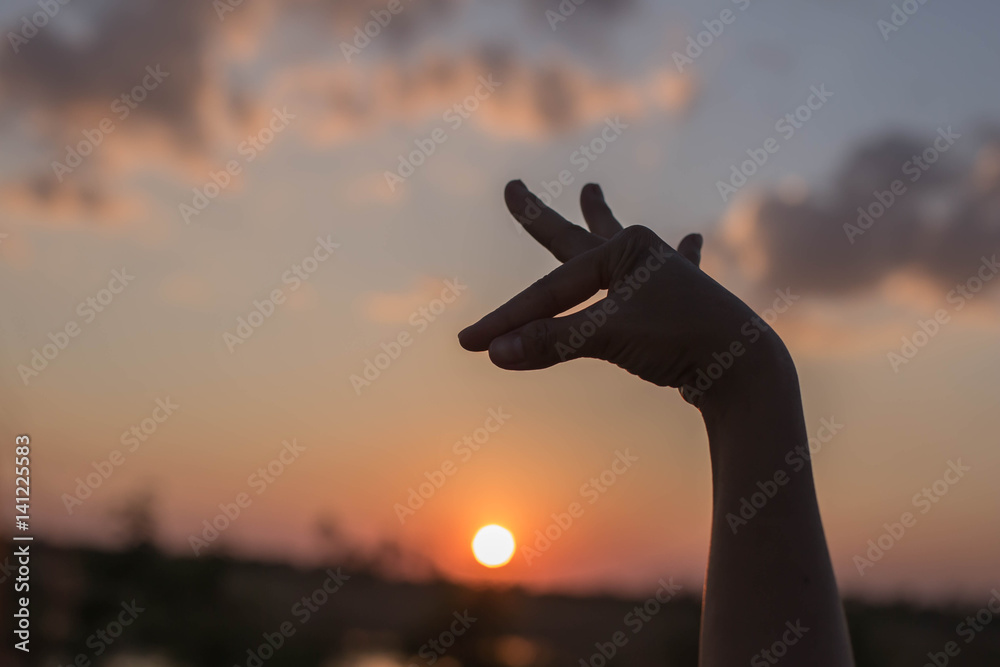 hands-shape for the Sun Stock Photo | Adobe Stock