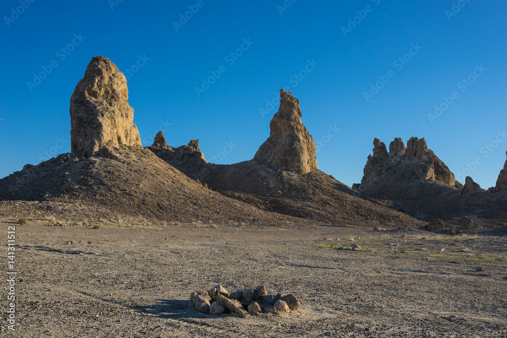 Campfire and campsite in the open desert widerness of California's ...