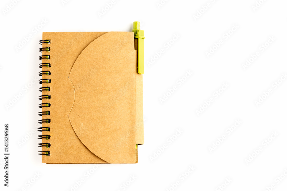 Notebook paper and a pen on white background. Stock Photo | Adobe Stock