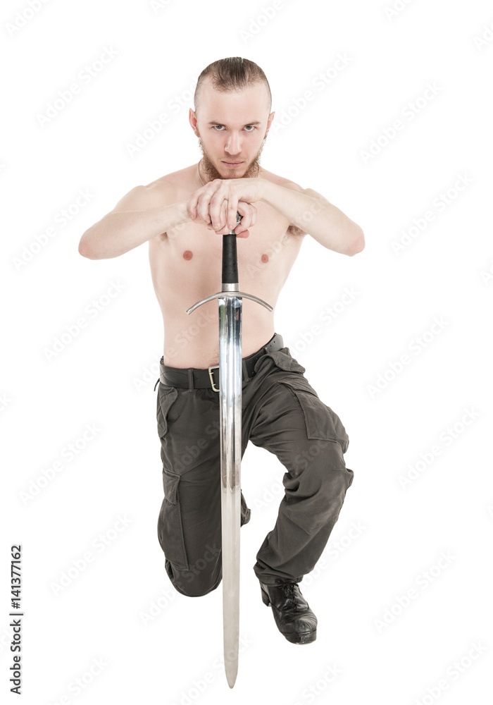 Young handsome man with sword isolated Stock Photo | Adobe Stock