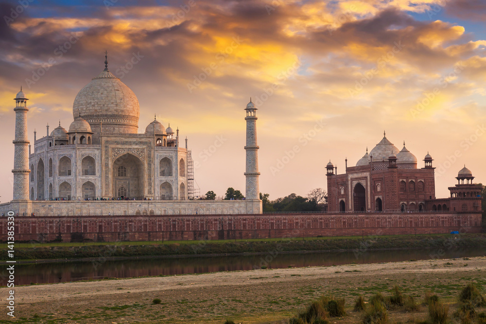 Historic Taj Mahal at sunset as viewed from Mehtab Bagh. Taj Mahal a ...