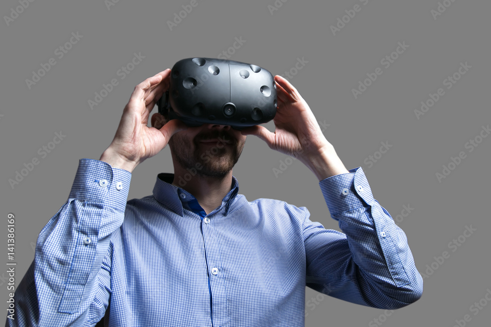 Man wearing virtual reality goggles. low key photo Stock Photo | Adobe ...