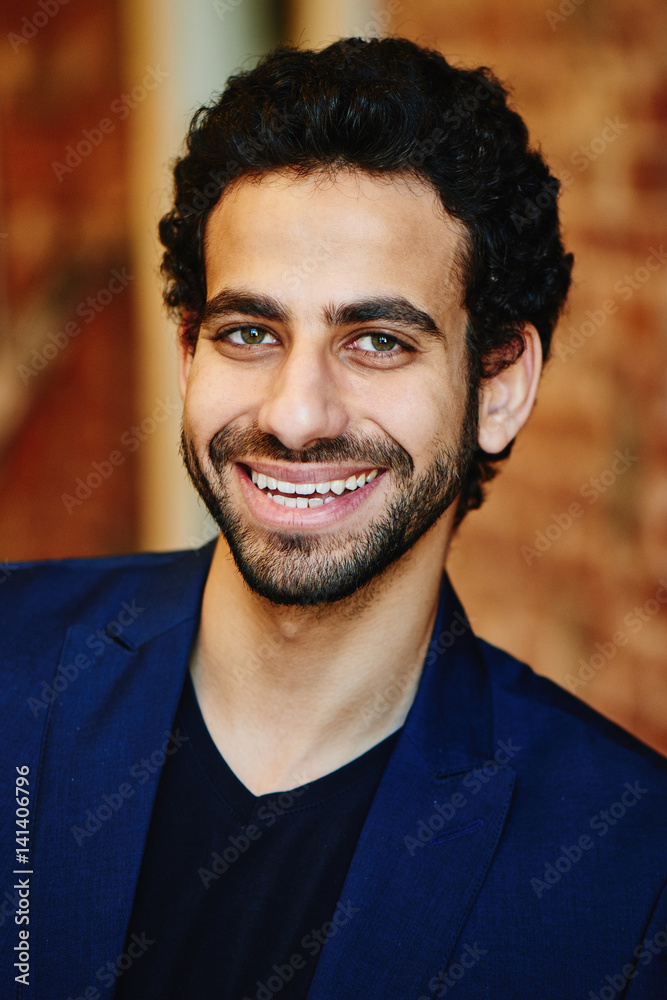 Portrait of Arab man in a blue suit closeup Stock Photo | Adobe Stock