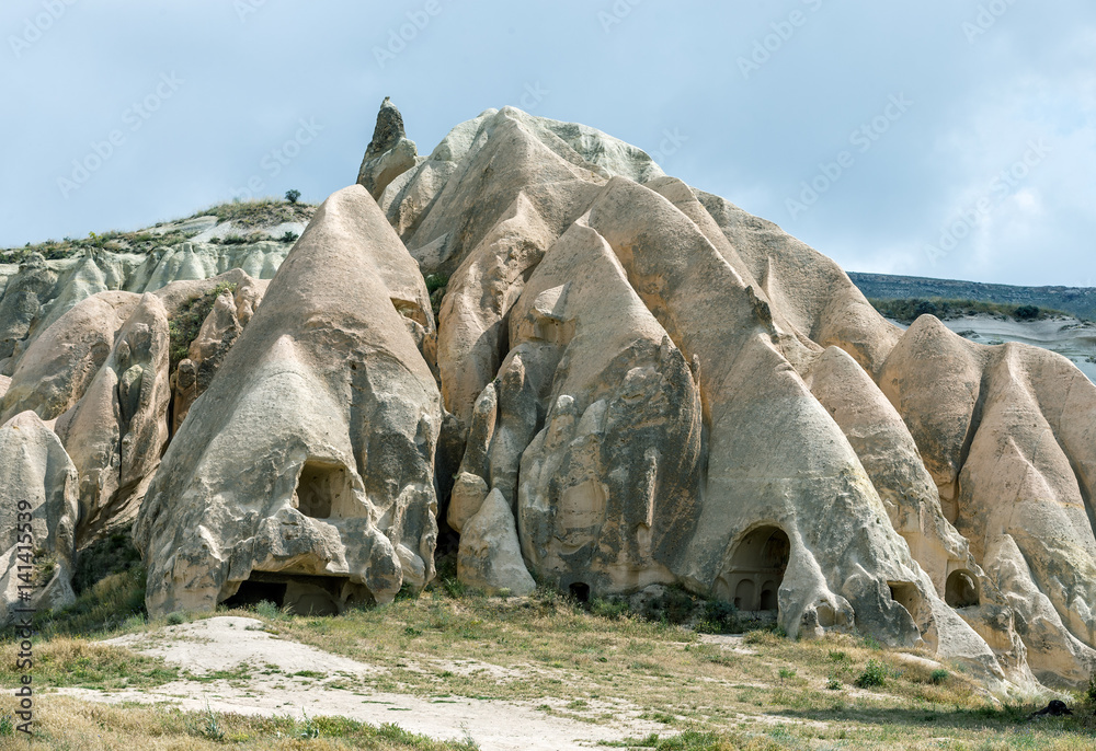 A geological formation consisting of volcanic tuff. Cappadocia in ...