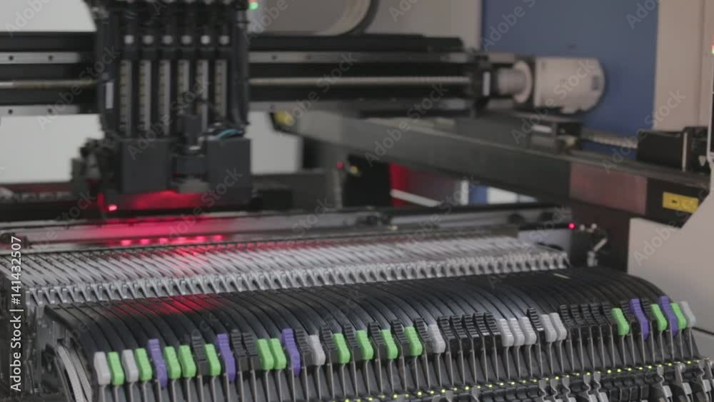 Automated Electronic circuit board production. Machine Produces Printed ...