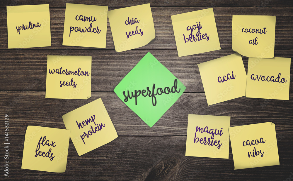 sticky notes on rustic wood background with superfood ingredients Stock ...