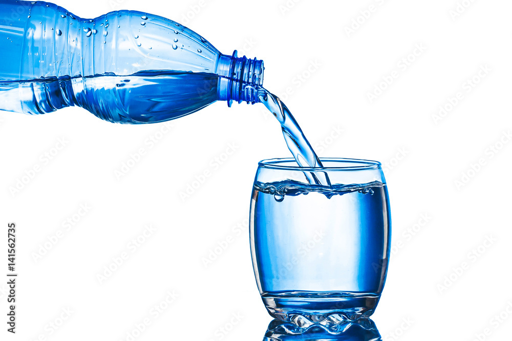 Water and plastic bottle. Pouring water splash bubbles inside the glass ...