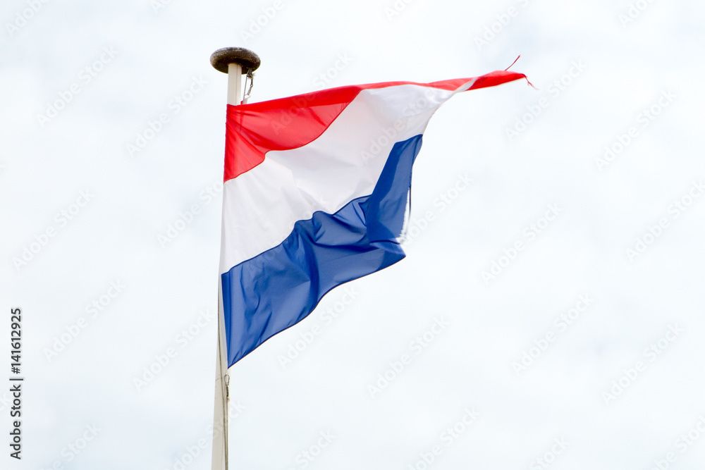 flag of the Netherlands floats in the sky Stock Photo | Adobe Stock
