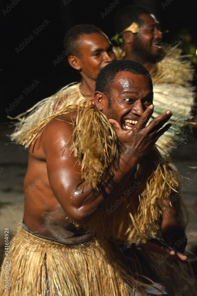 Fijian men dancing a traditional male dance meke wesi in Fiji Stock ...