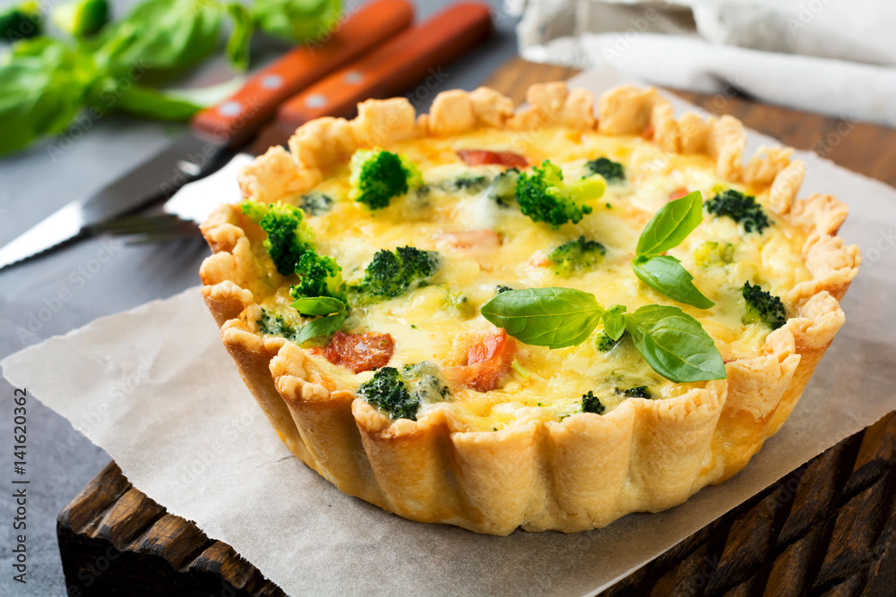 Homemade quiche tart with red fish salmon, broccoli, basil, seasonings ...
