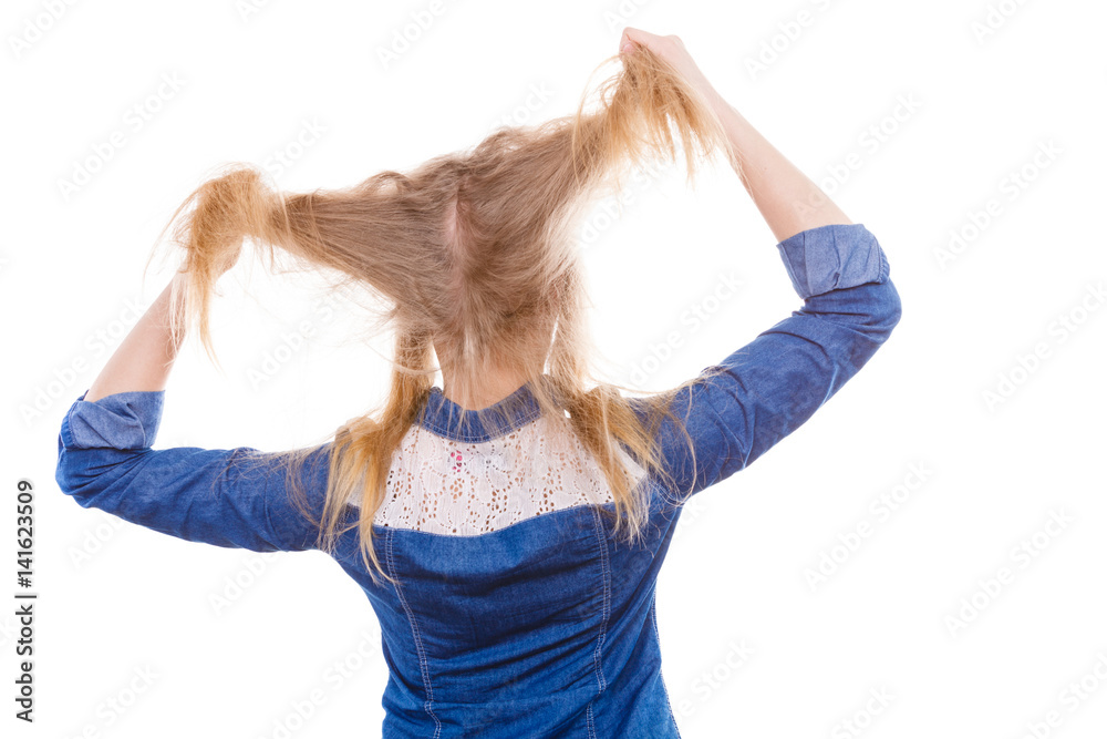 Furious woman pull hair out of head. Stock Photo | Adobe Stock