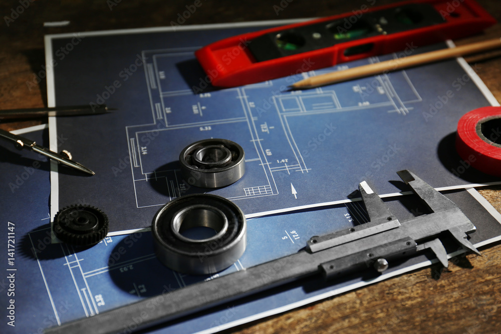 Different kinds of engineering tools and construction drawings on ...