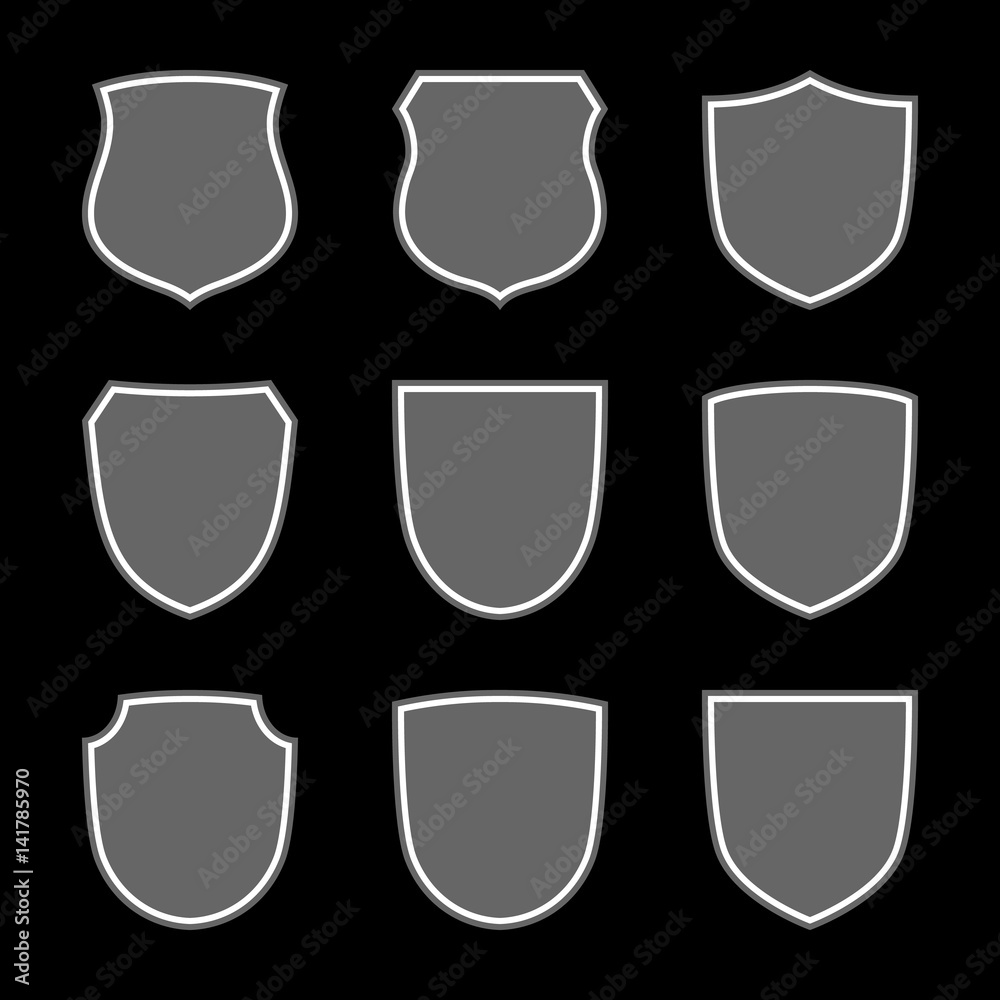 Shield shape icons set. Gray label signs isolated on black background ...
