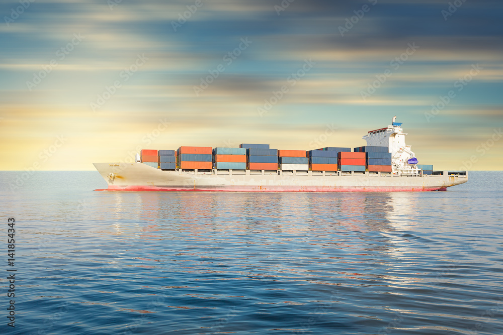 Cargo ship and cargo container in sea with clear sky background. Stock ...