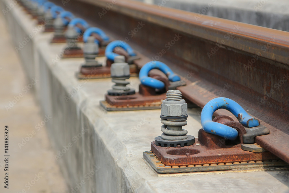 Close up Rail fastener for hold rail with concrete track plinth of sky ...