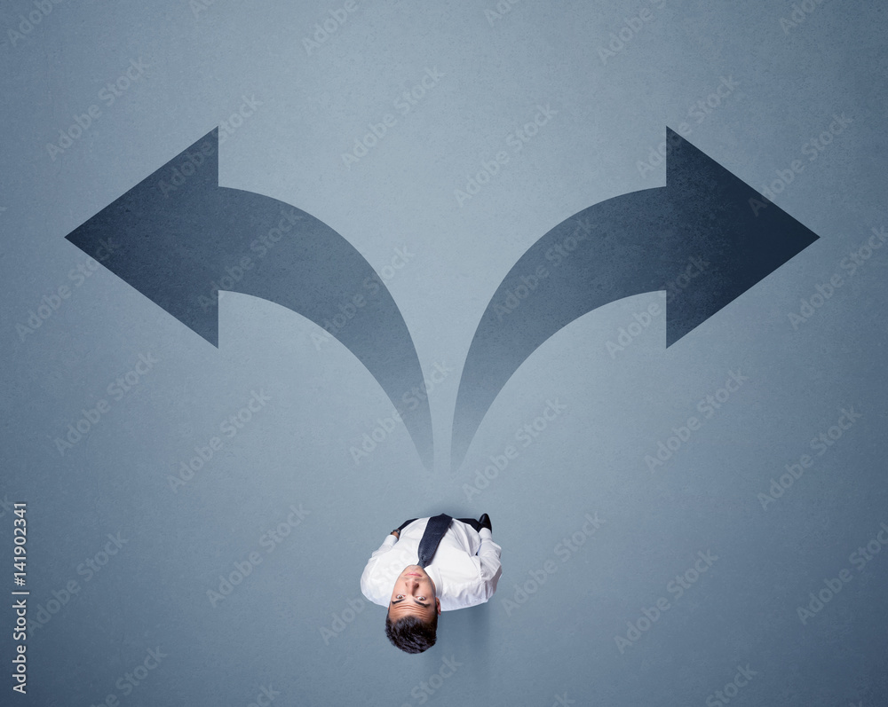 Businessman making a decision Stock Photo | Adobe Stock