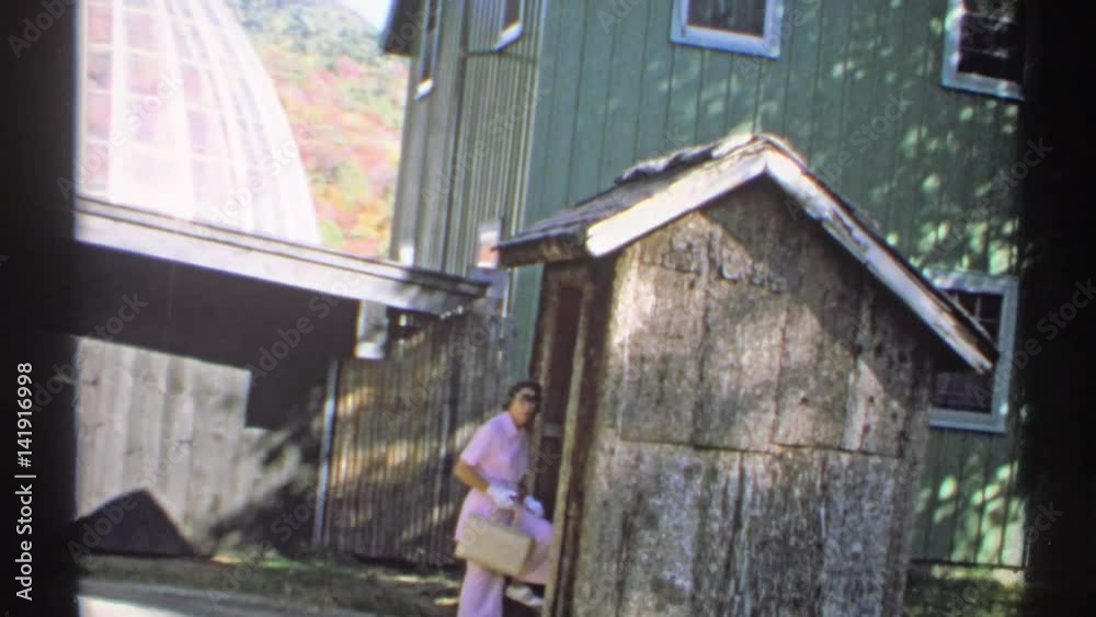 1971: old lady in pants and gloves entering shed and changing her mind ...