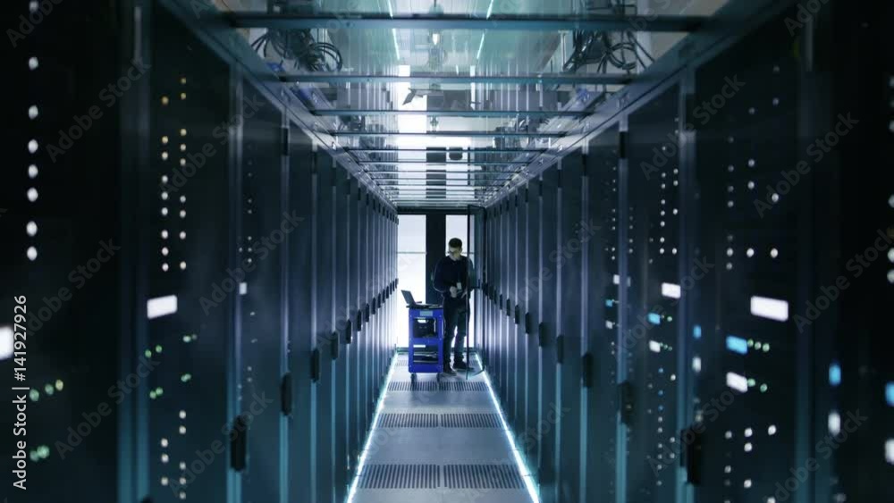 IT Engineer With Crash Cart Puts Hard Drives into Open Rack Server ...