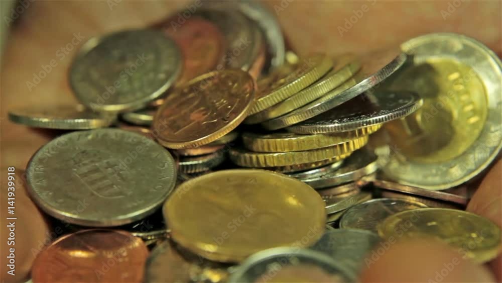 Coins in Hands. Close up shot Stock Video | Adobe Stock