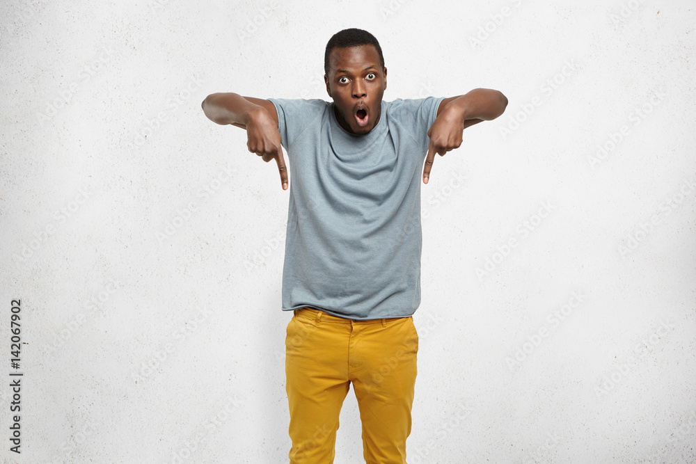 Check this out! Cropped studio shot of attractive excited young African ...