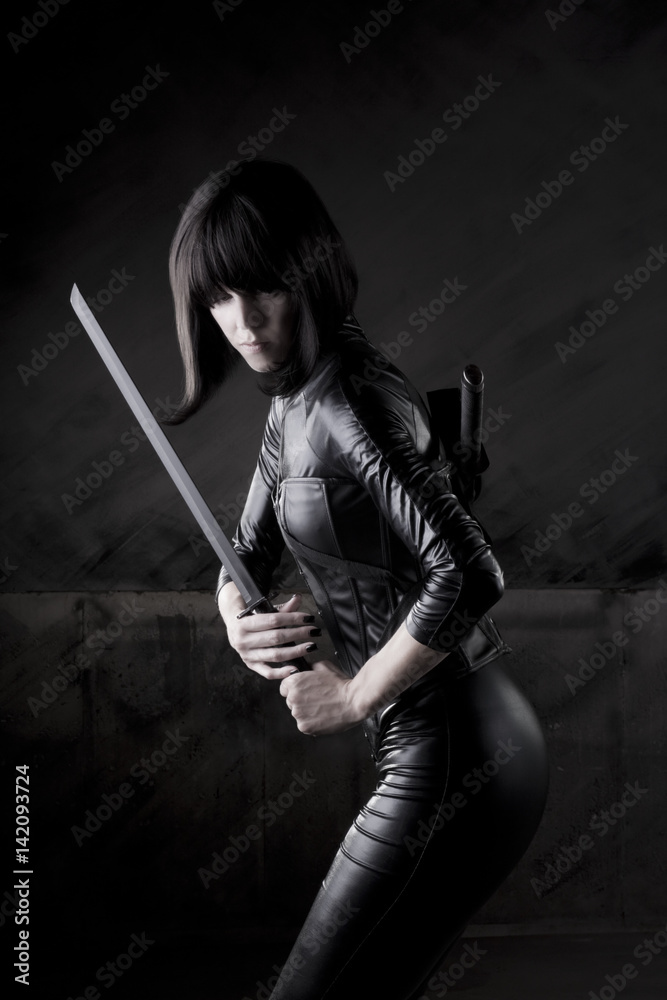 Sexy assassin female model Stock Photo | Adobe Stock